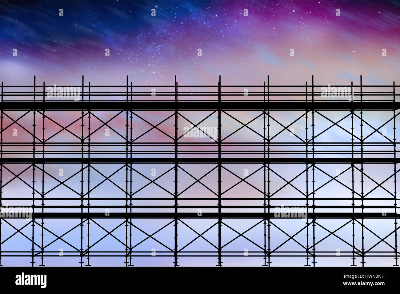 3d image of construction scaffolding against aurora night sky in purple ...