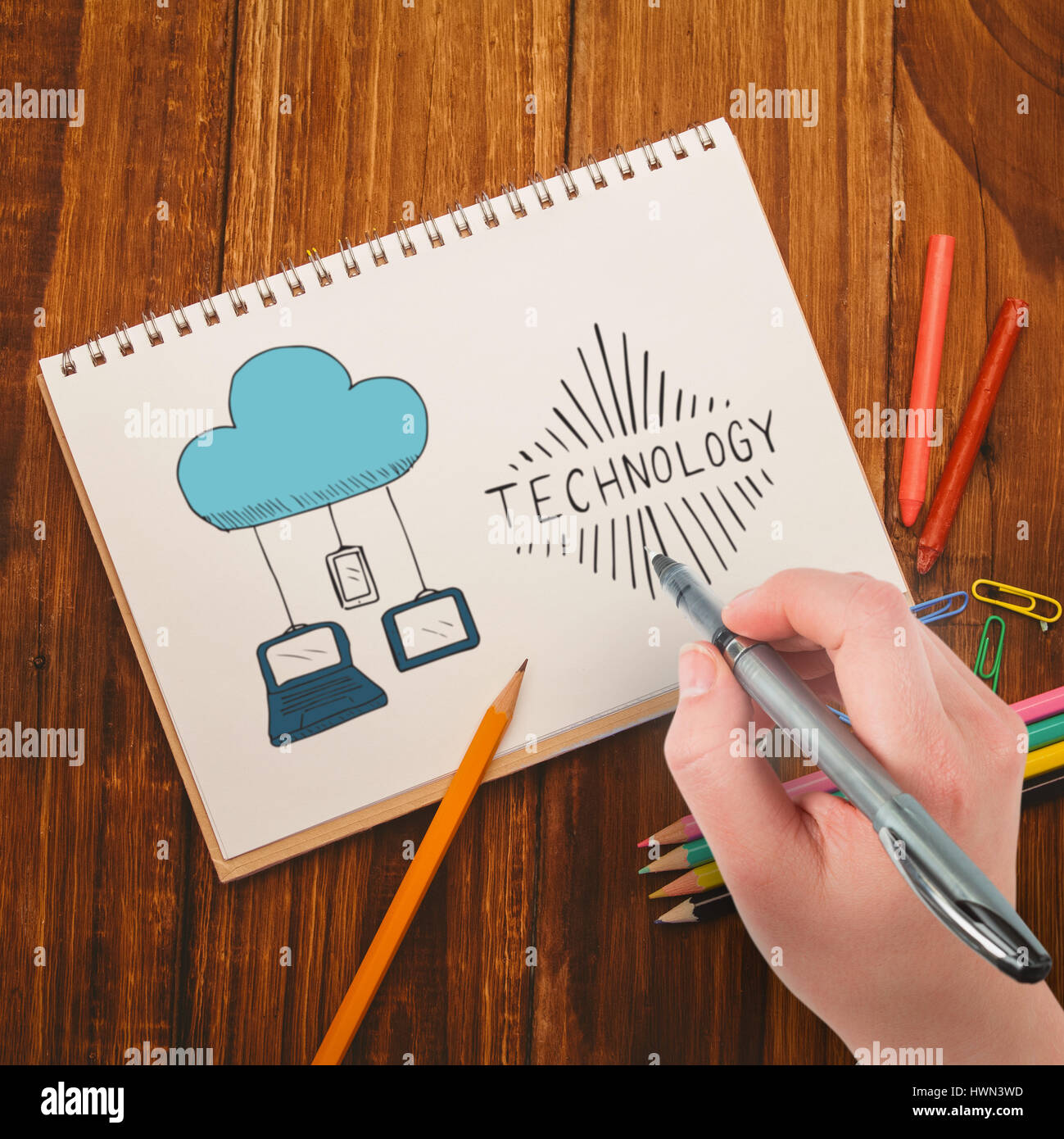 Businesswomans hand writing with pen against notepad on student desk ...