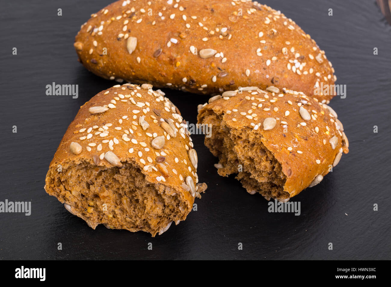 Multi grain bread with different seeds Stock Photo - Alamy