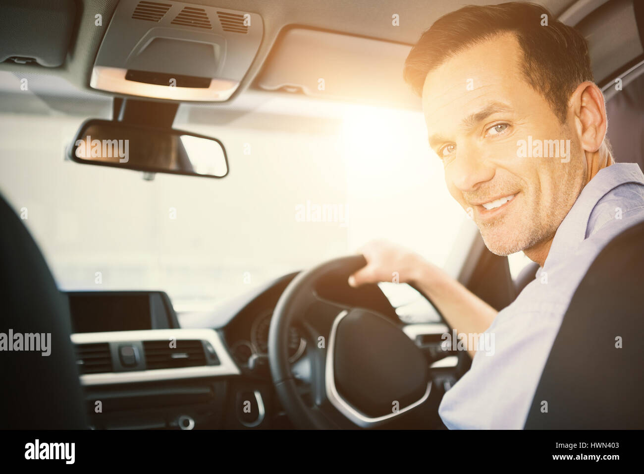 Men driving a car Stock Photo - Alamy