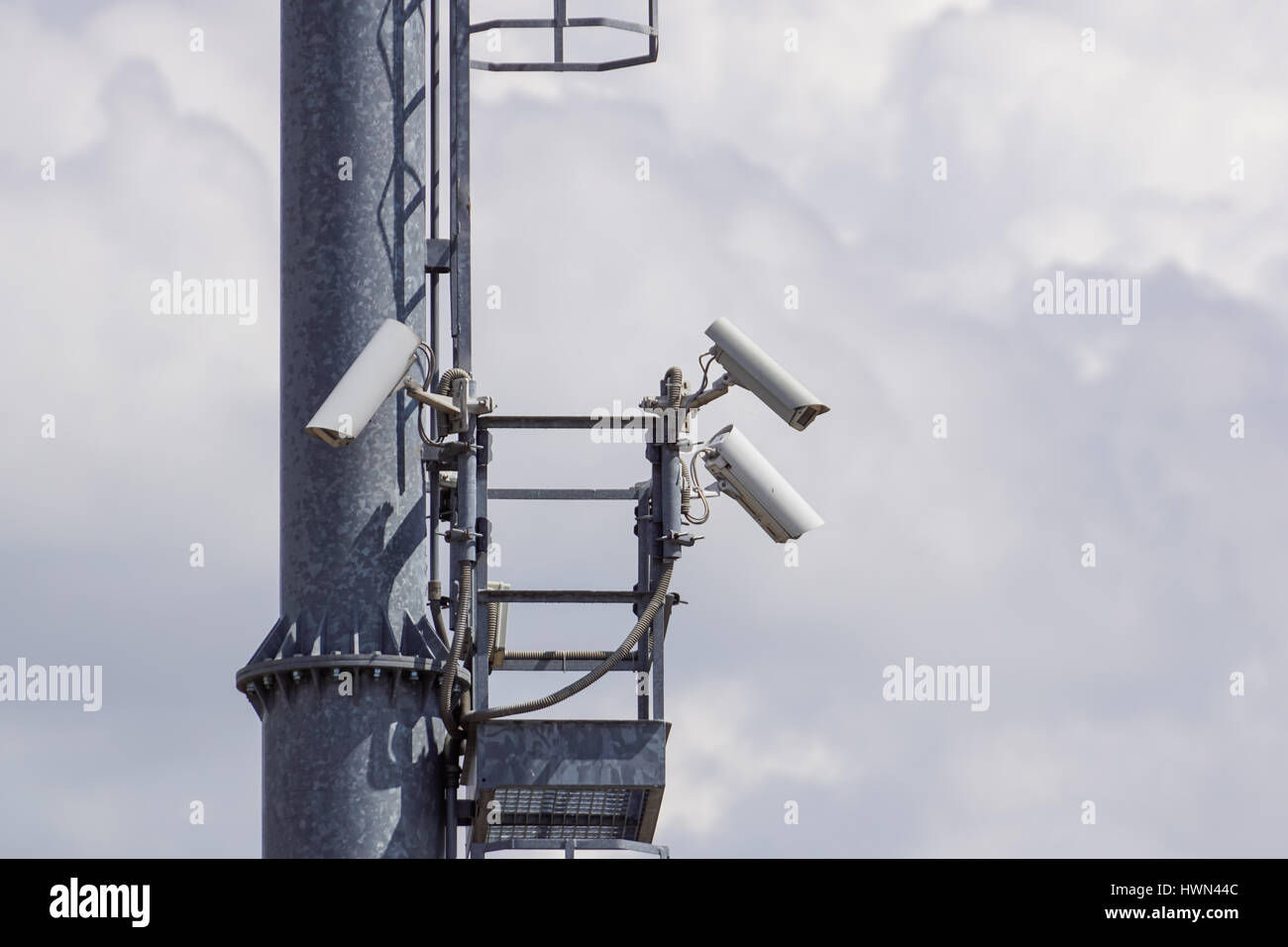 security cctv cameras on a pole with blue sky background Stock Photo ...