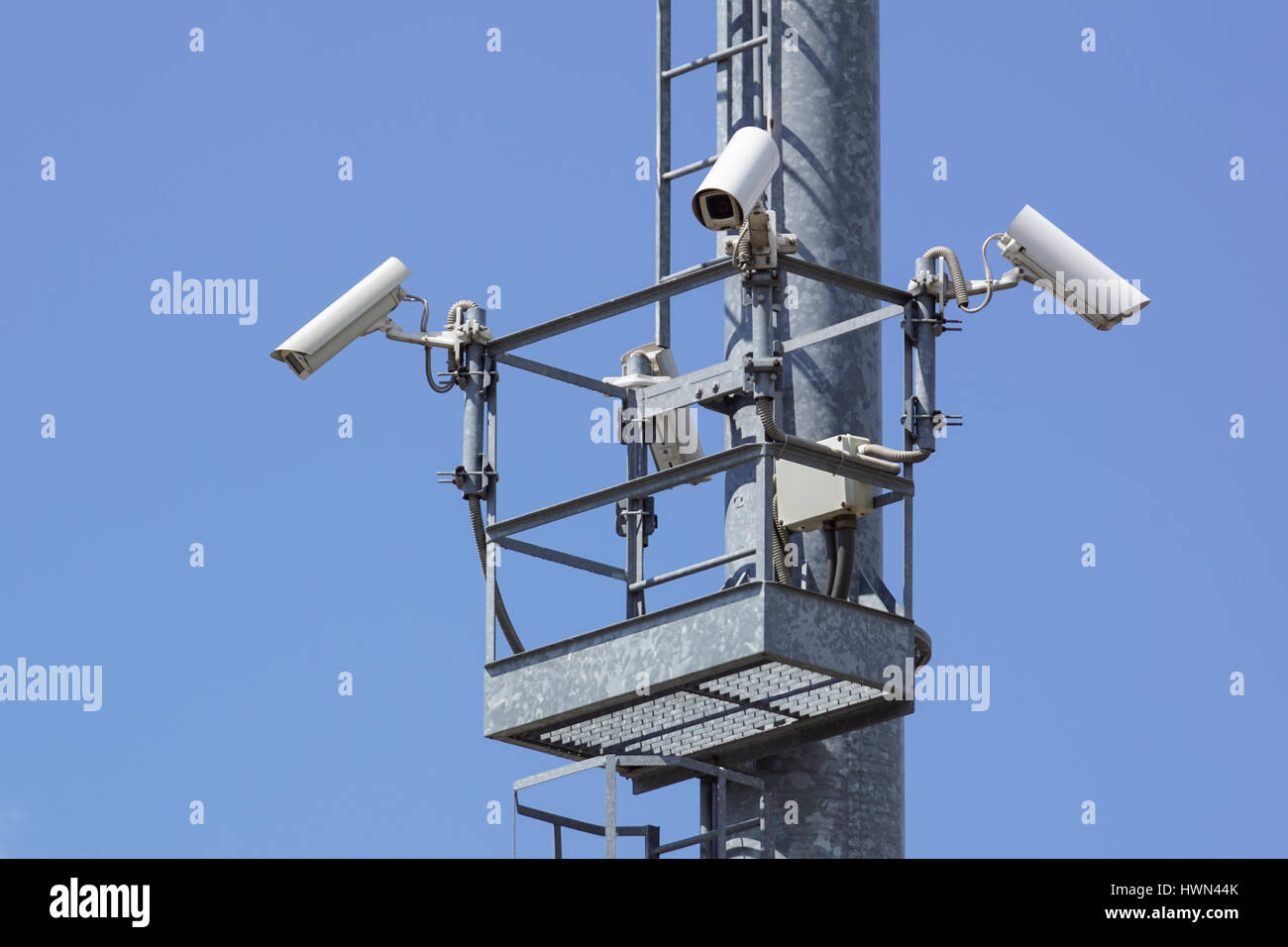security cctv cameras on a pole with blue sky background Stock Photo ...