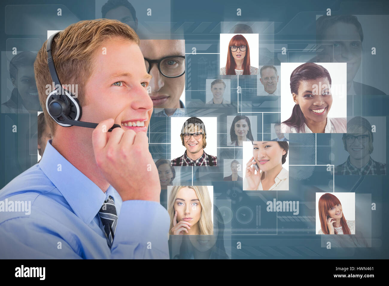 Handsome agent with headset against dark blue background Stock Photo ...
