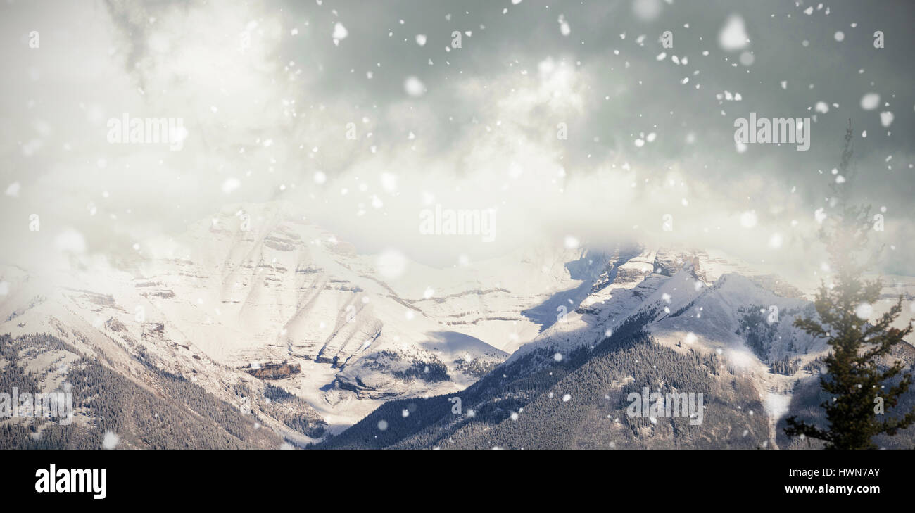 Scenic view of snowy mountain range against sky Stock Photo - Alamy