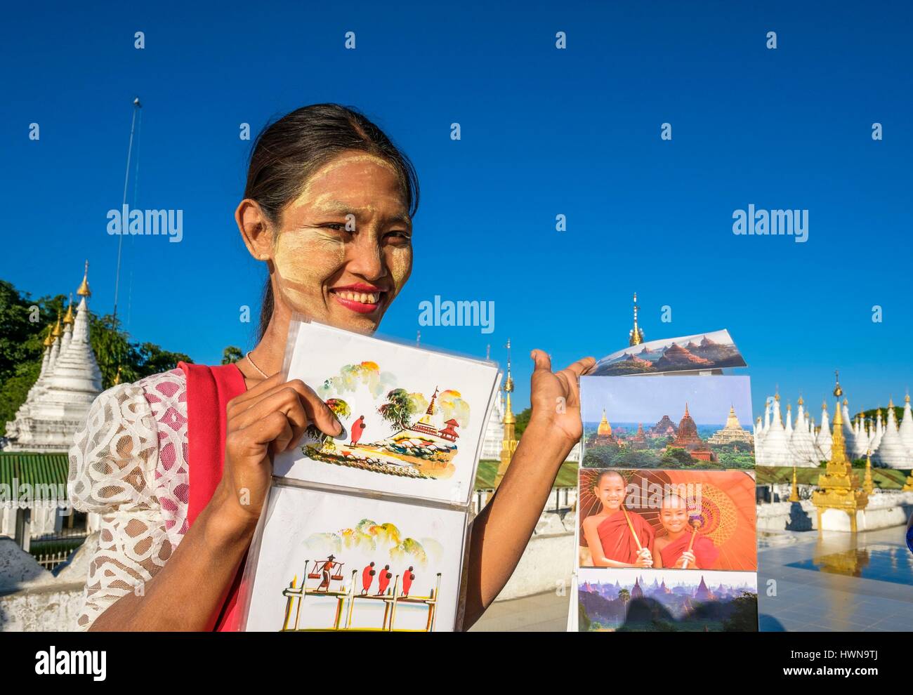 Myanmar (Burma), Mandalay region, Mandalay, young girl selling ...