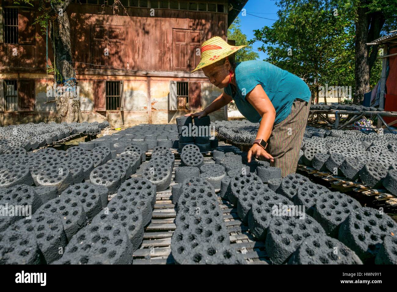 Myanmar (Burma), Mandalay region, Mandalay, handmade coal bricks Stock ...
