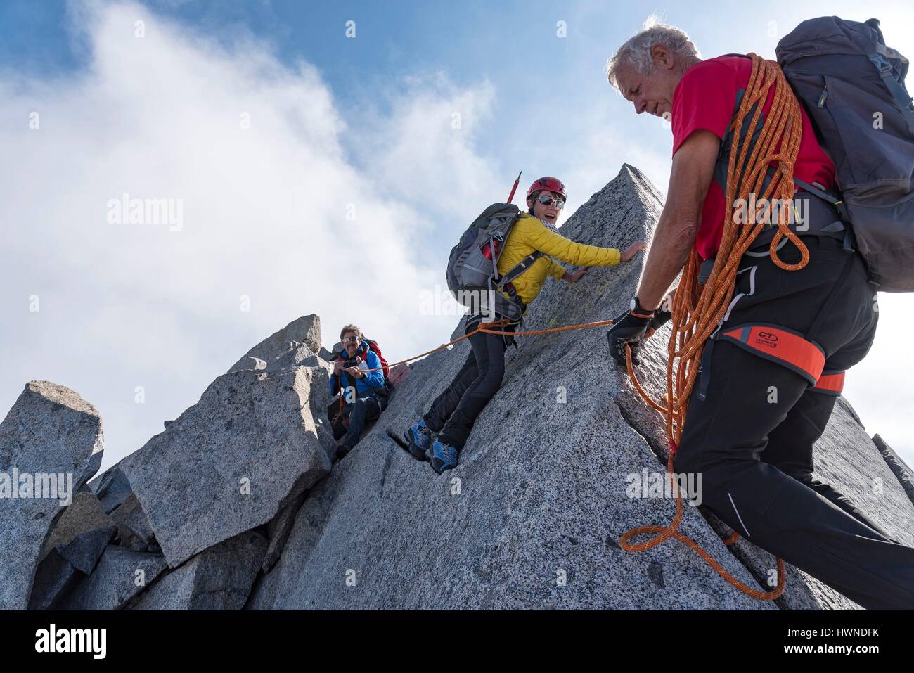 Italy, Lombardy, Temu, hikers progressing on the crest of Cresta Croce ...