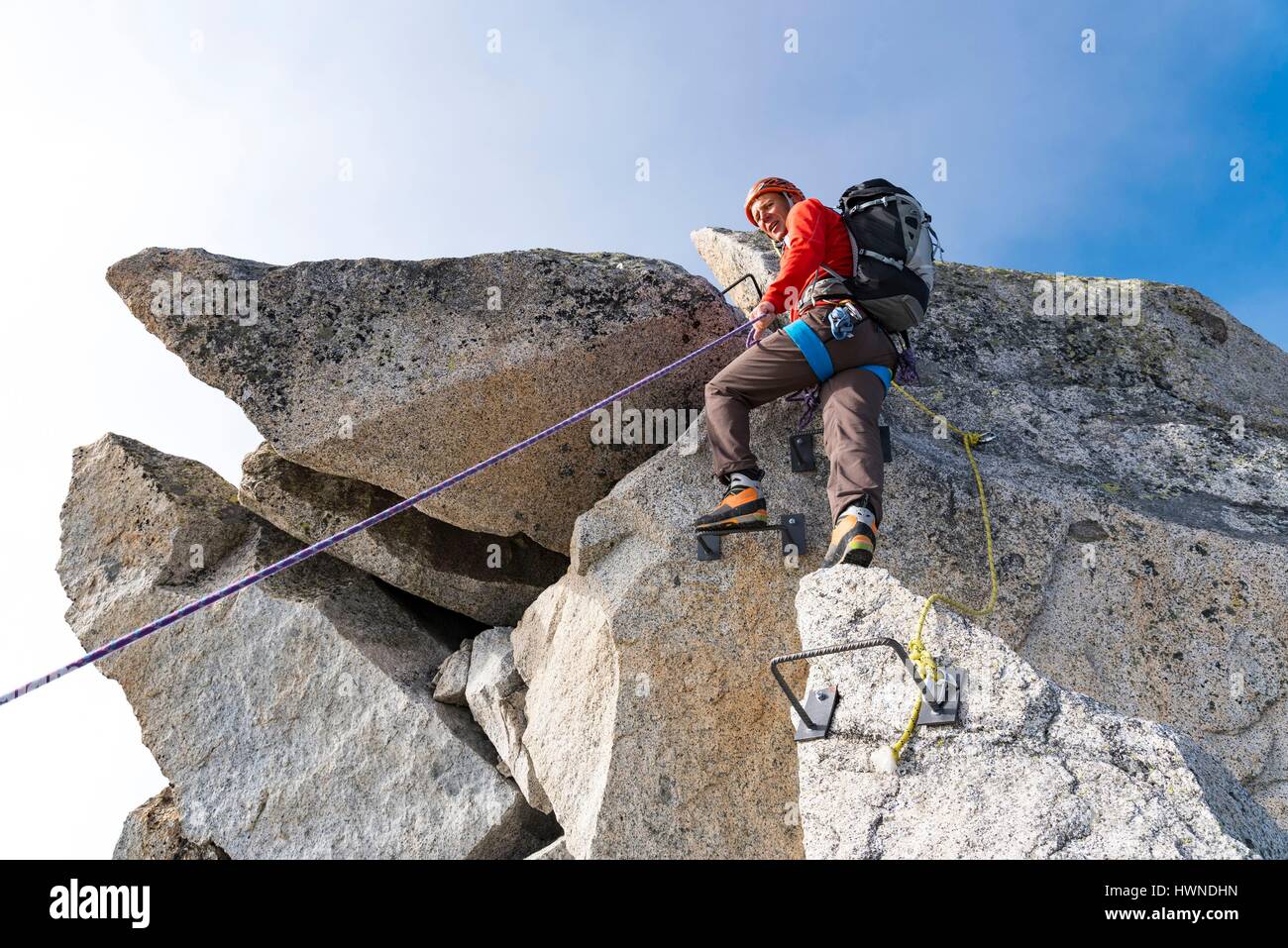 Italy, Lombardy, Temu, hikers progressing on the crest of Cresta Croce ...