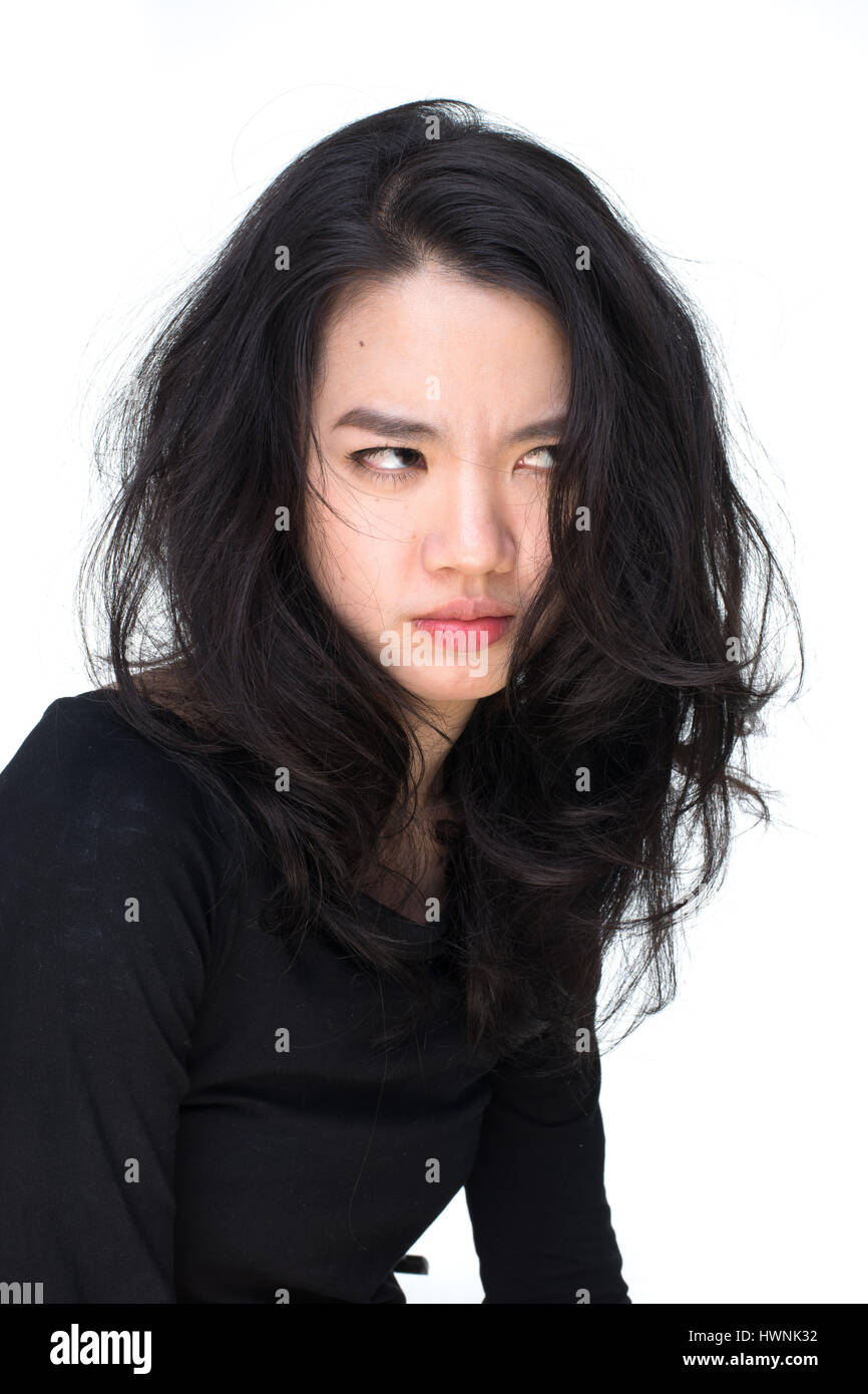 Beautiful but depressed asian isolated on white Stock Photo - Alamy