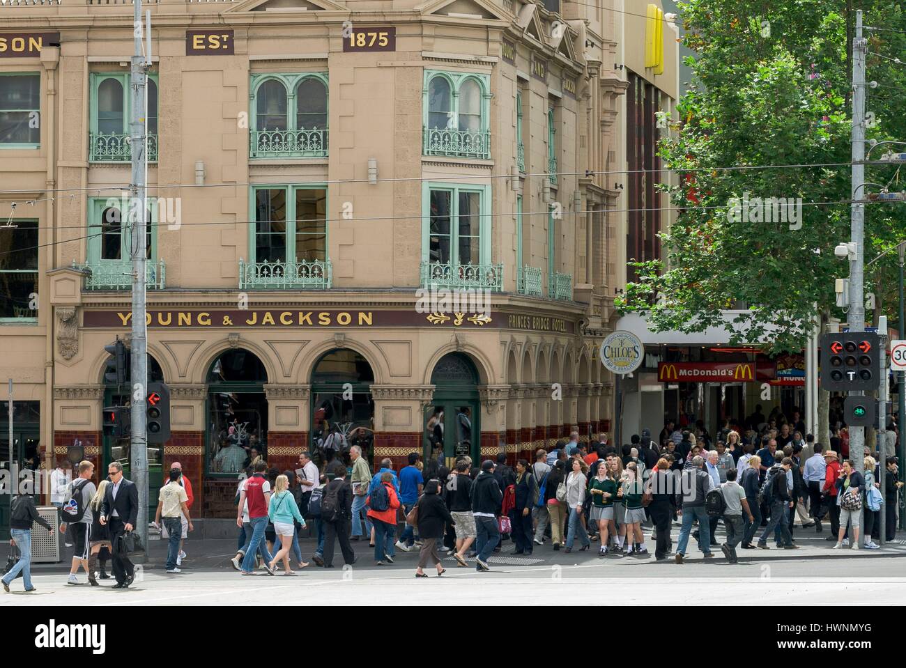 Australia, Victoria, Melbourne, crowd at the corner of Flinders Street ...
