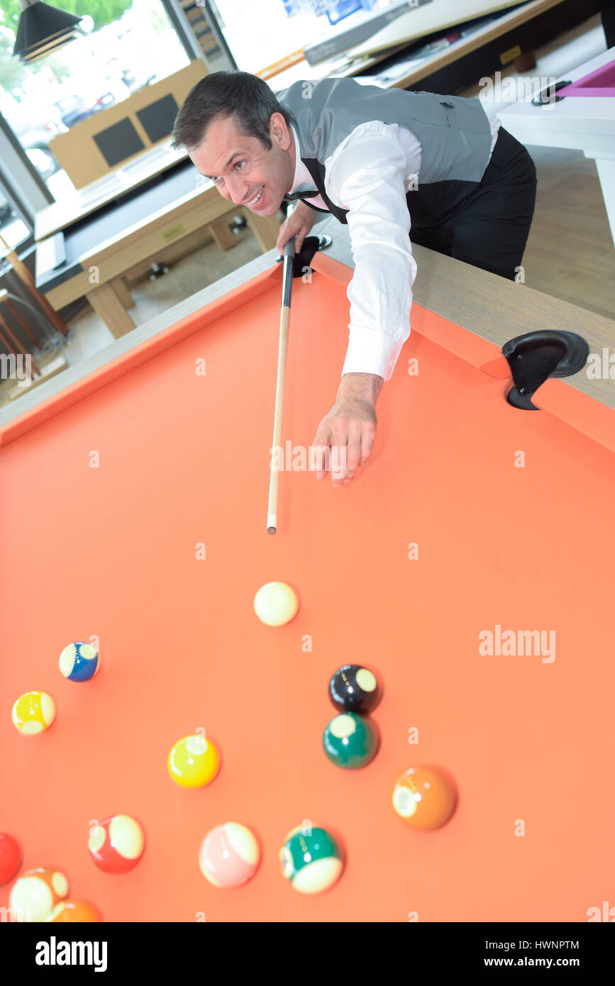 Man playing pool Stock Photo - Alamy