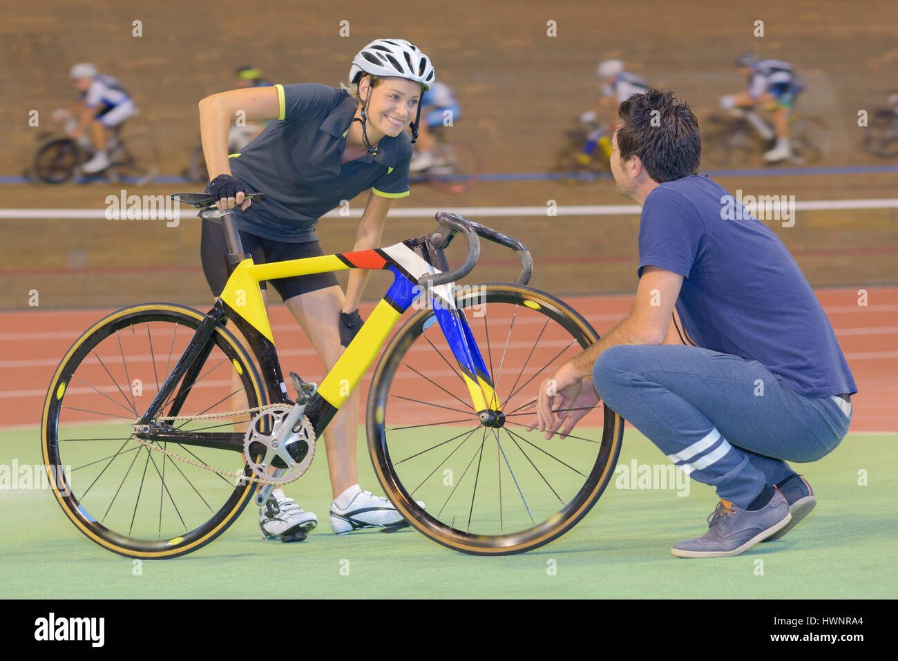 cyclist and the coach Stock Photo - Alamy