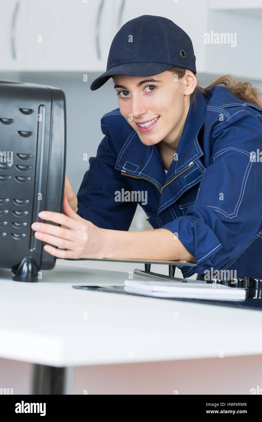 Appliance repair woman hi-res stock photography and images - Alamy