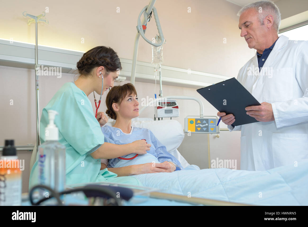 assisting a patient Stock Photo - Alamy