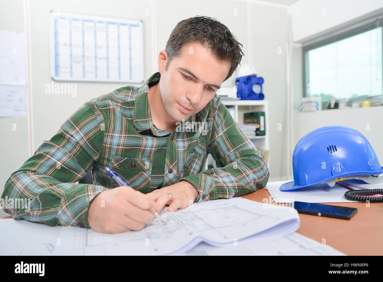 man drawing a blueprint Stock Photo - Alamy