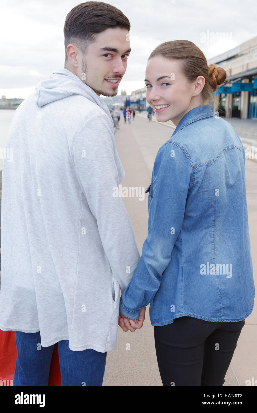 young couple wandering in the city Stock Photo - Alamy