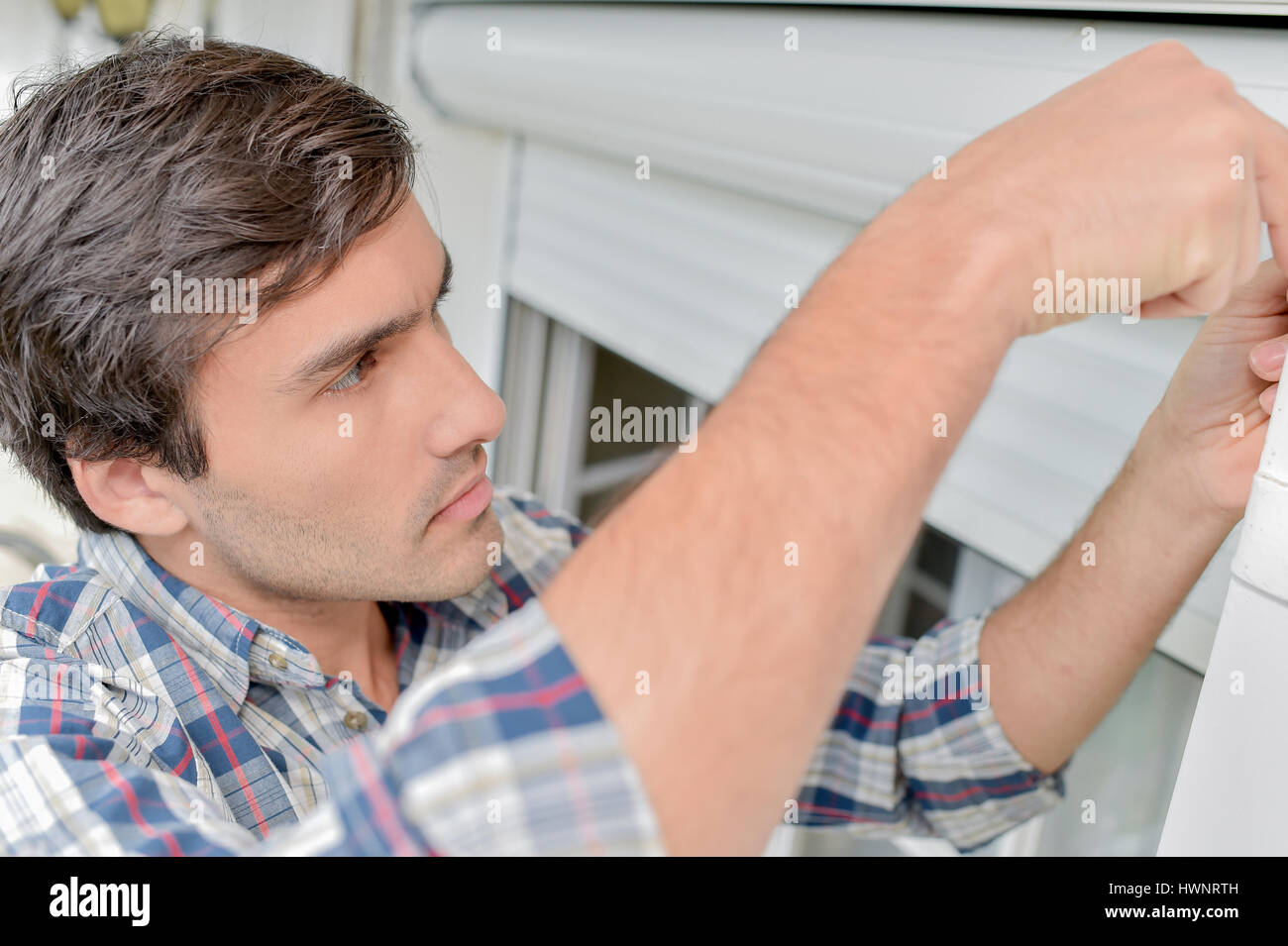 Fitting a window Stock Photo - Alamy
