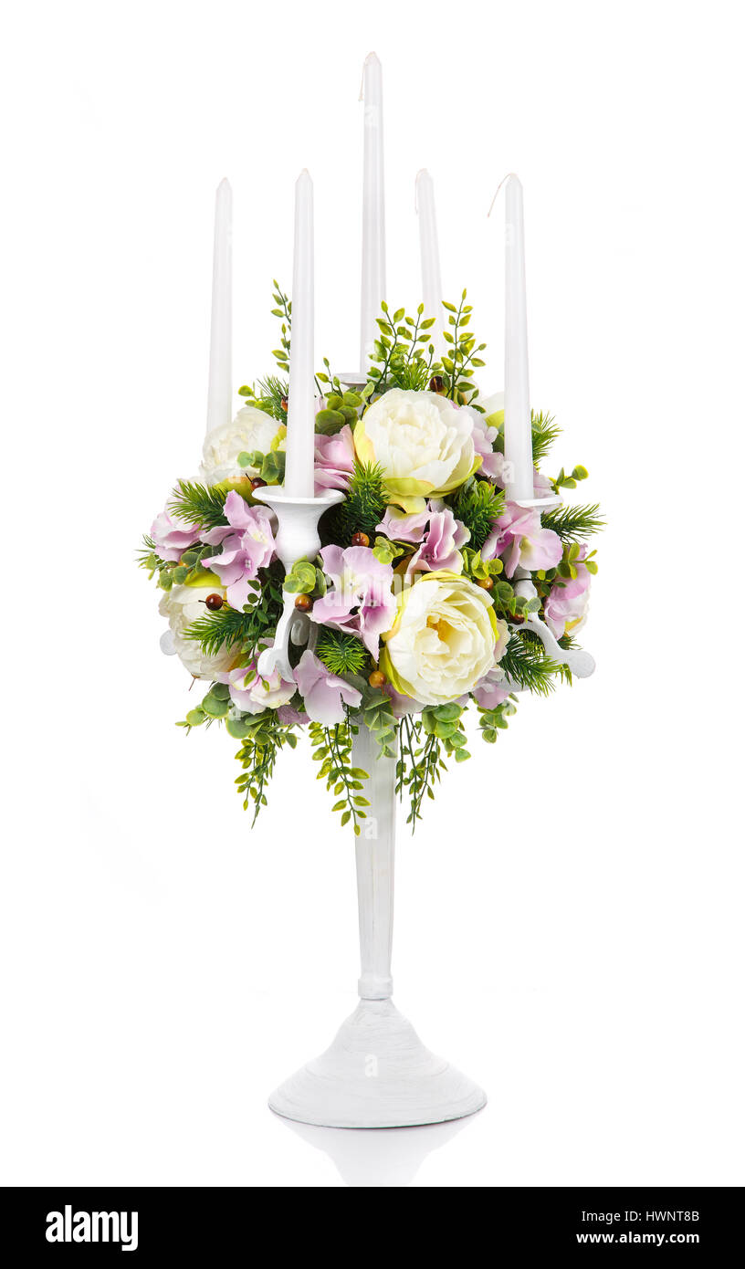 Festive flower arrangement to decorate. candlestick Stock Photo - Alamy