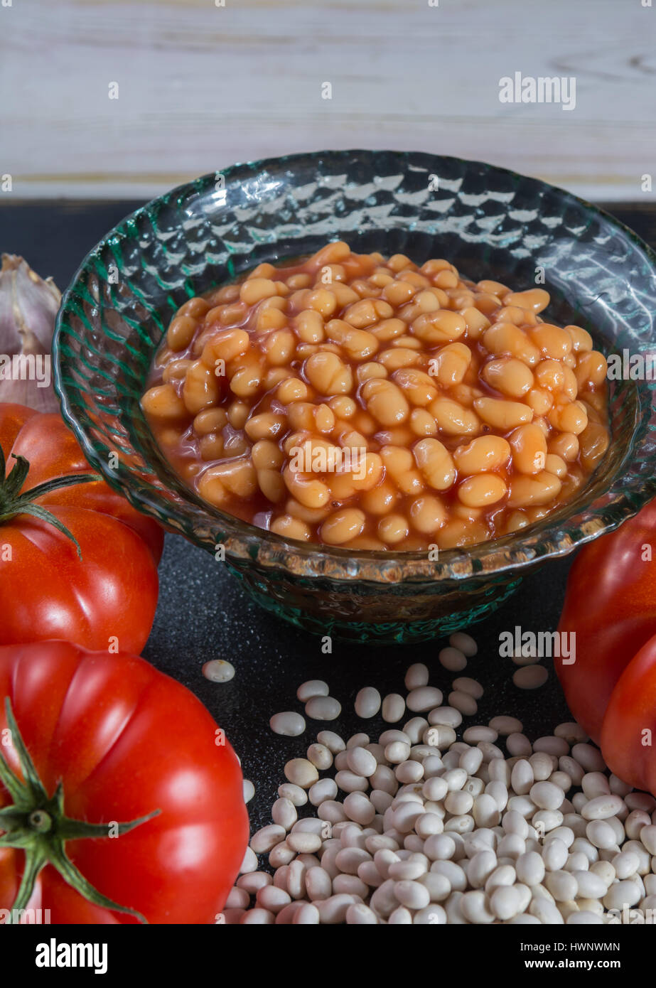 Traditional English food - baked white beans in tomato sauce and ...