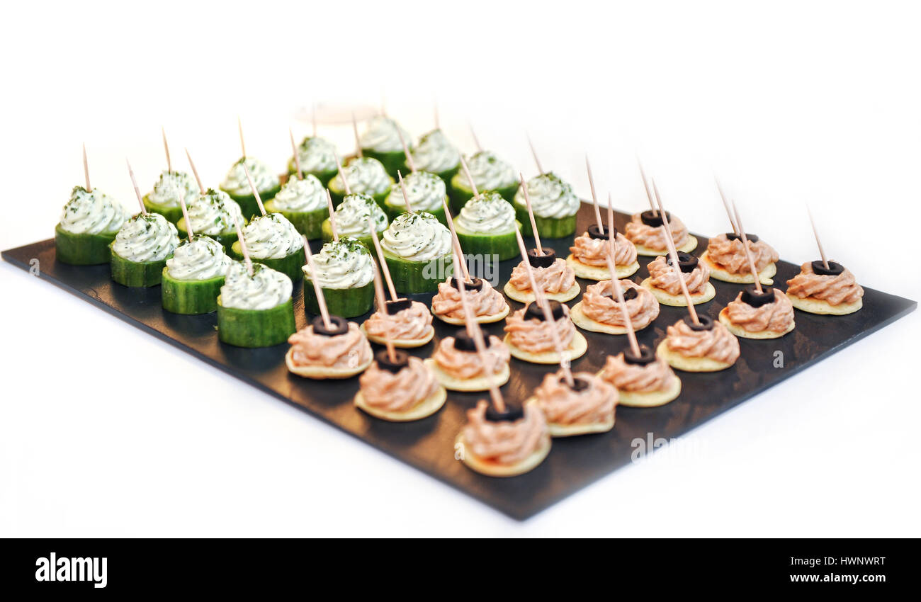 Assorted savoury snacks on festive table .Holiday Appetizers Stock ...