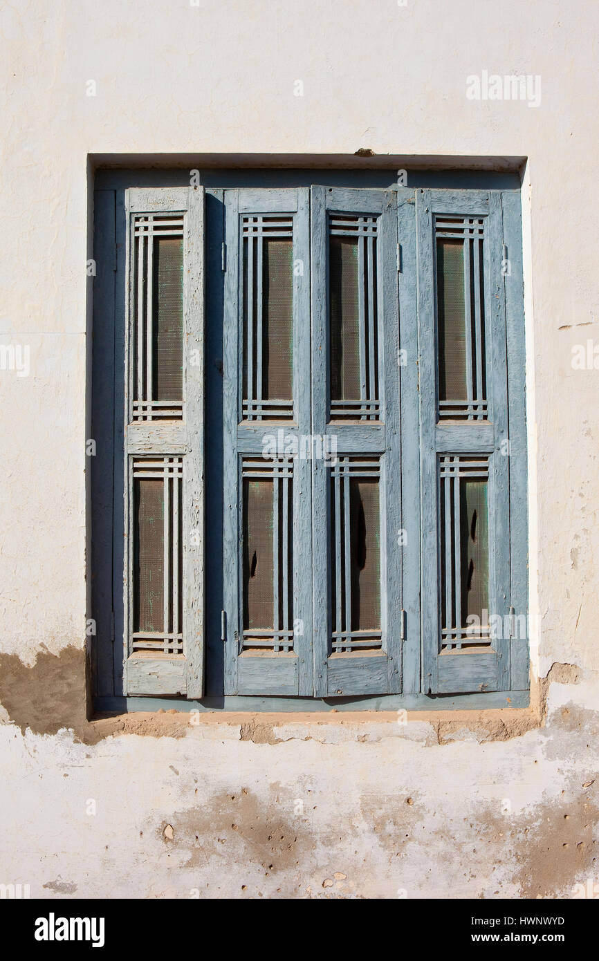 traditional old wooden windows in rajasthan with blue weathered paint ...