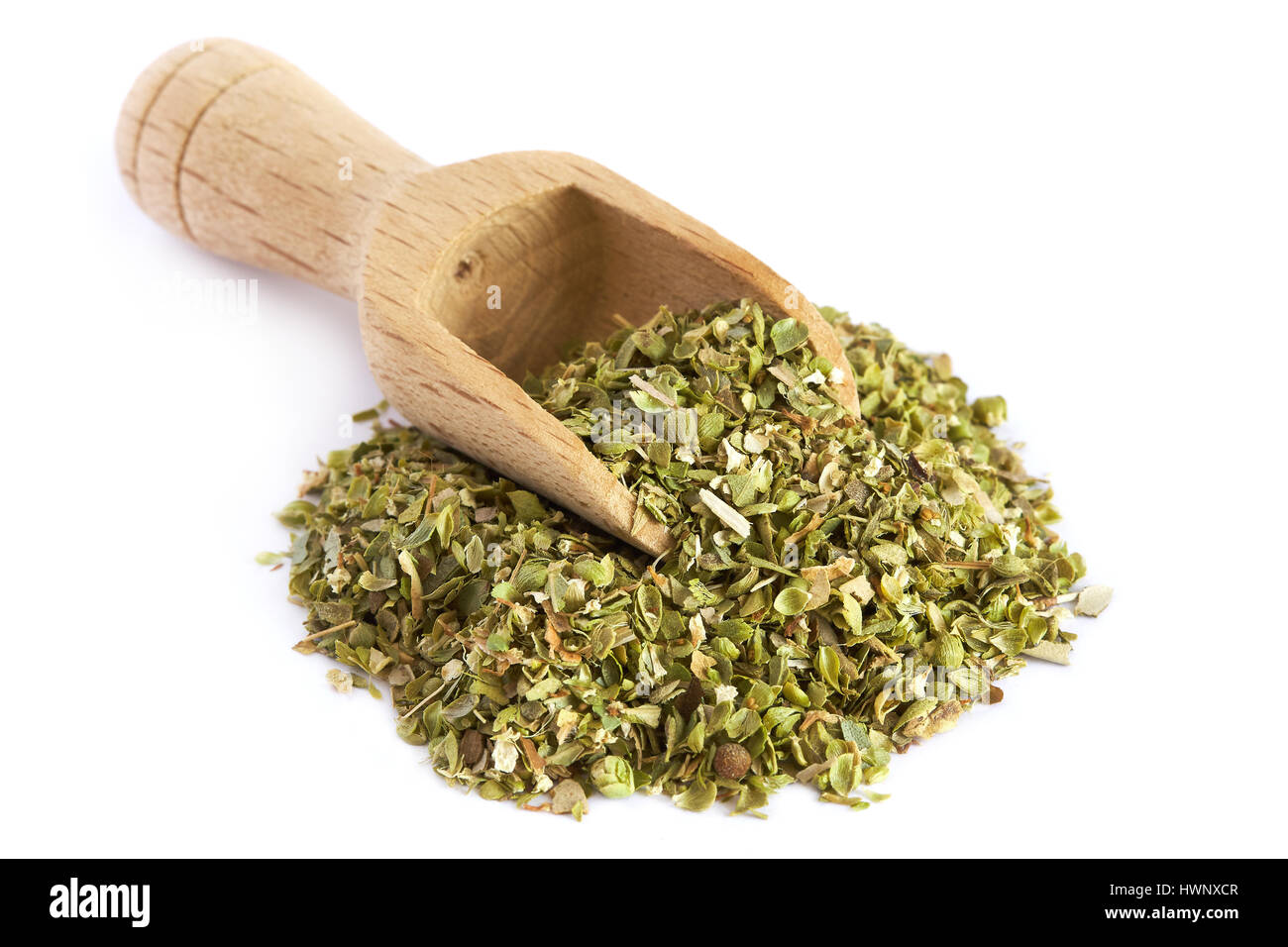 Dried oregano spice with wooden scoop isolated on white background ...