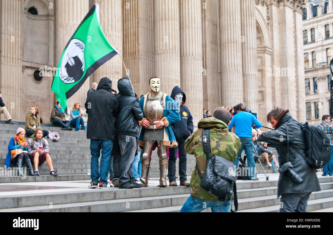 Anonymous supporters, protesting during the Occupy movement, outside St ...