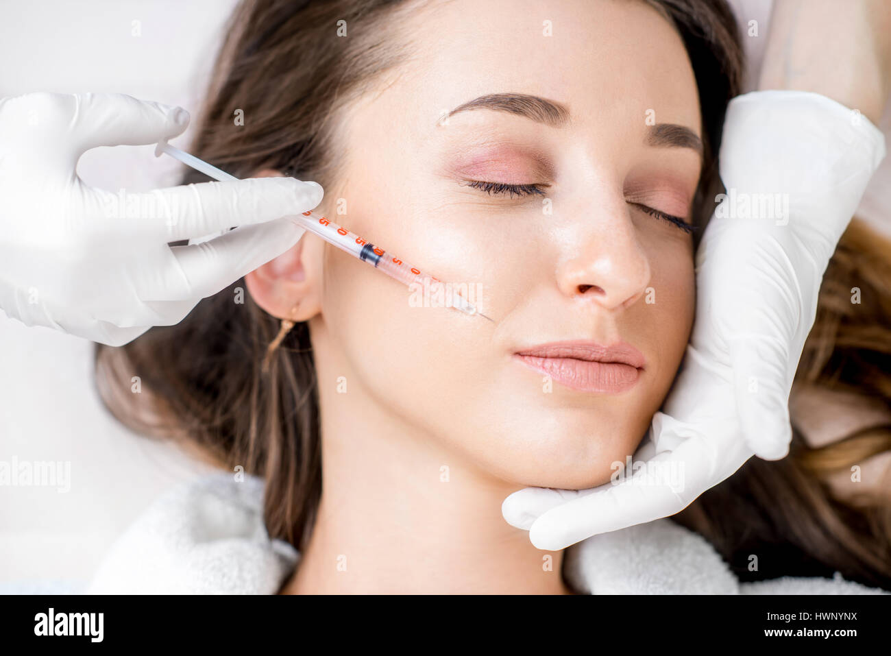 Cosmetic botox injection Stock Photo - Alamy