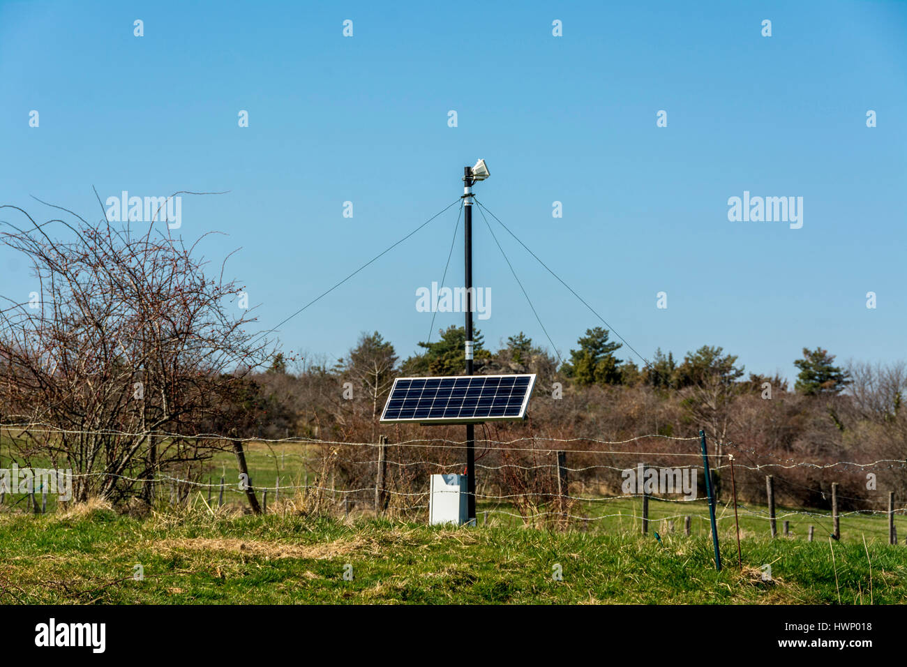 Solar panel providing power for an electric fence Stock Photo - Alamy