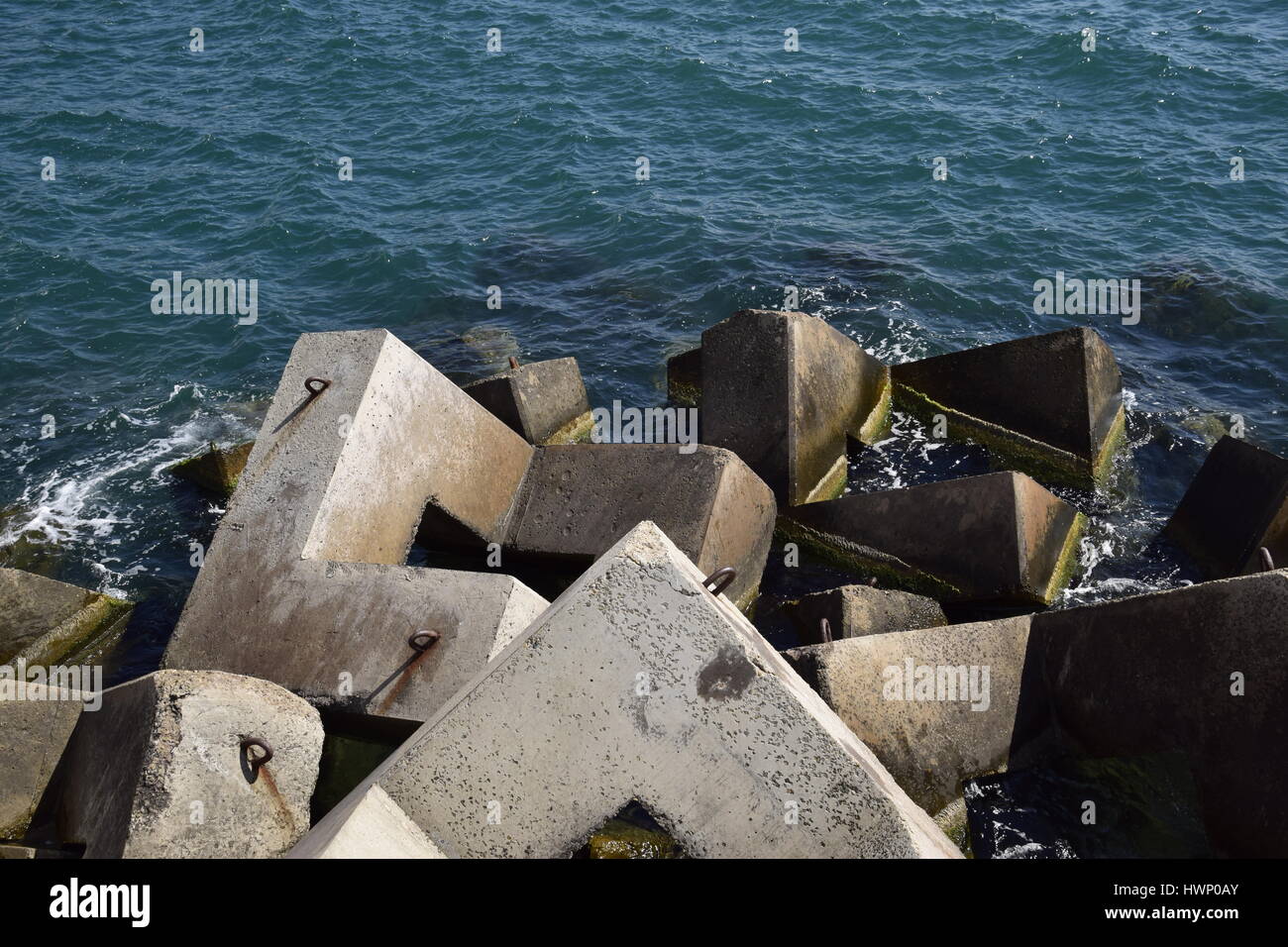 Breakwater blocks in the port. Breakwater of the rectangular stone ...