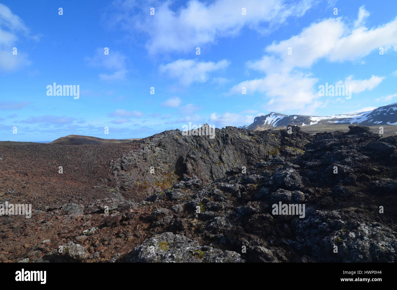 Field of lava rock in Iceland surrounding Eldborg Crater Stock Photo ...