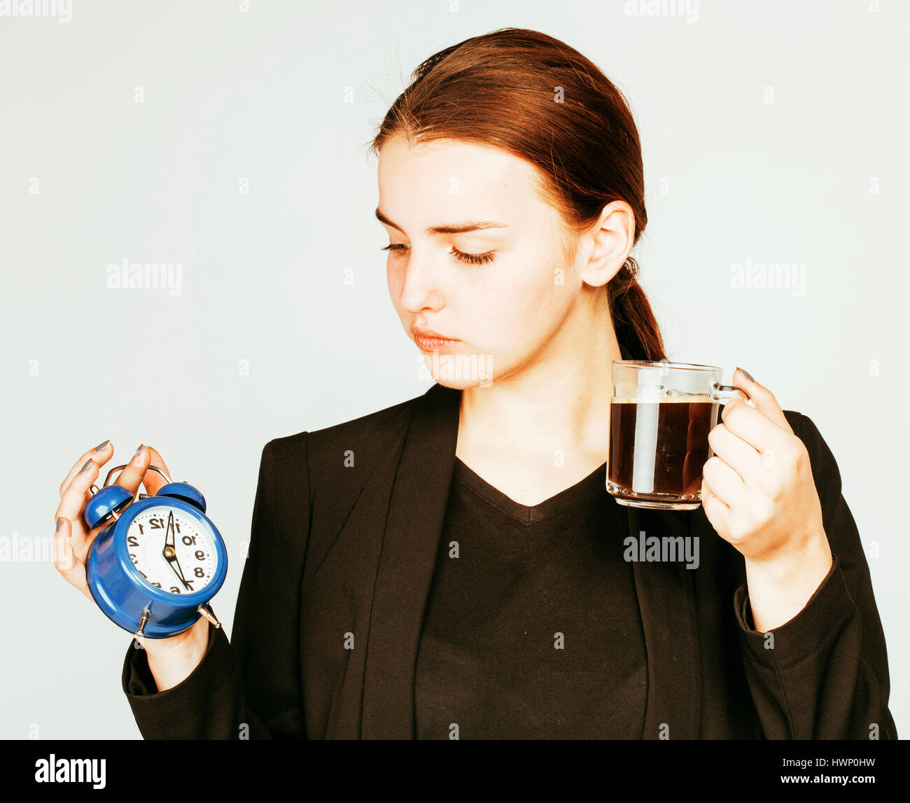 young beauty woman in business style costume waking up for work Stock ...