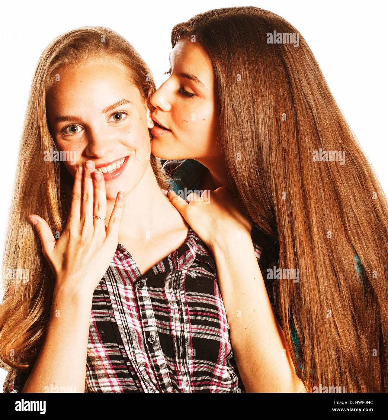 two cute teenagers having fun together isolated on white Stock Photo ...