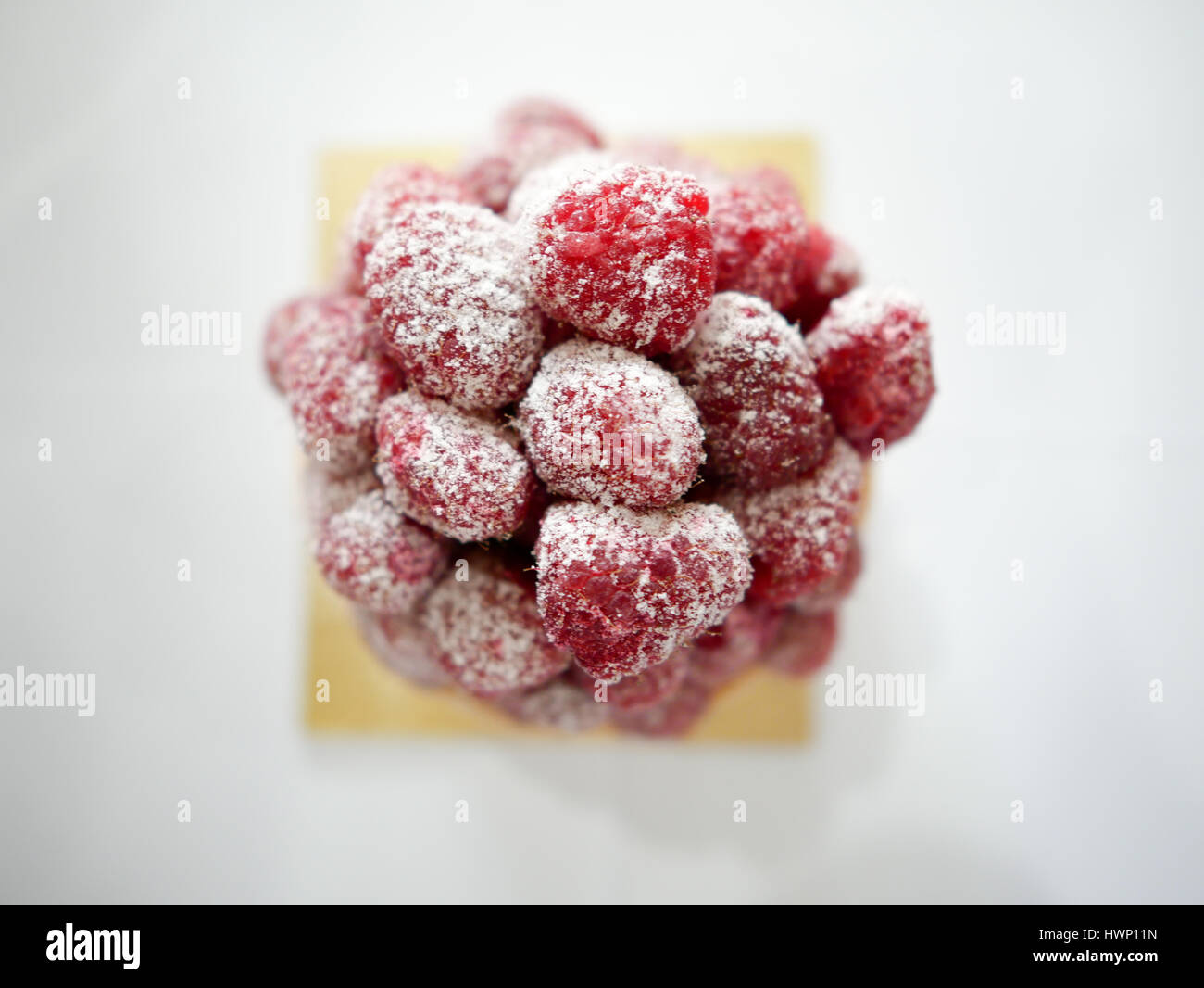 Close up raspberry tart with white background Stock Photo - Alamy