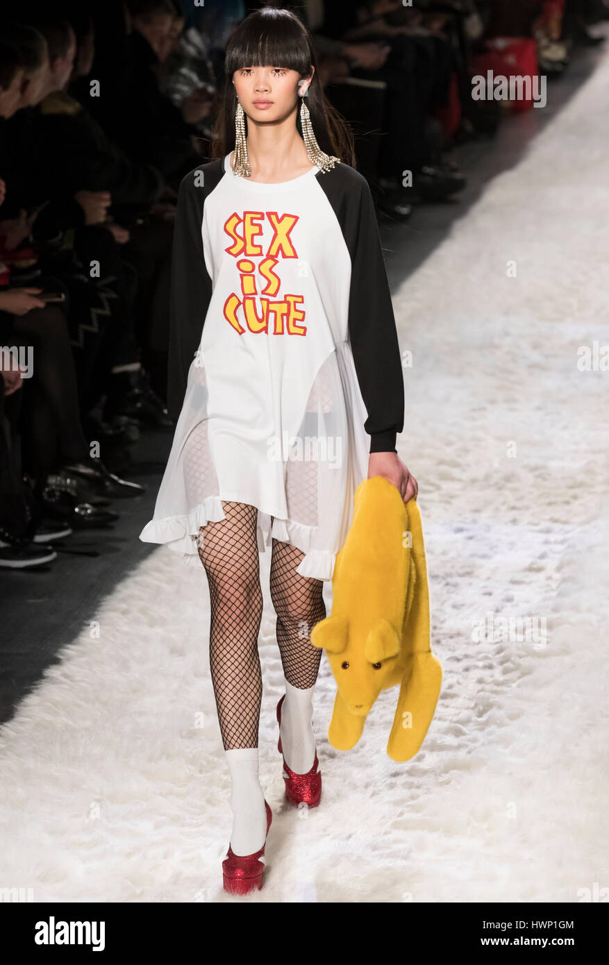 NEW YORK, NY - FEBRUARY 10, 2017: Huan Zhou walks the runway at the ...