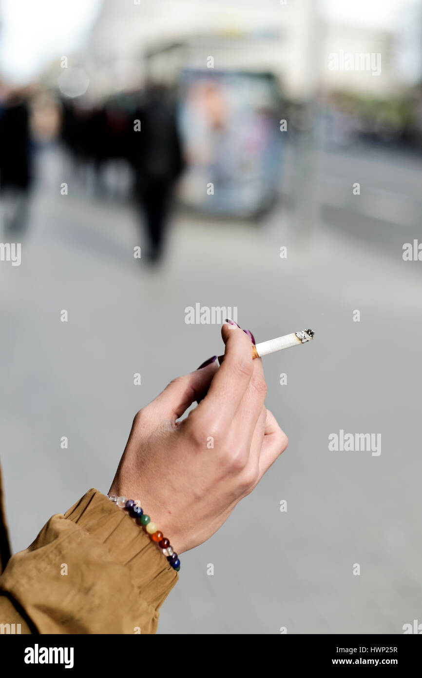Young woman smoking tobacco hi-res stock photography and images - Alamy