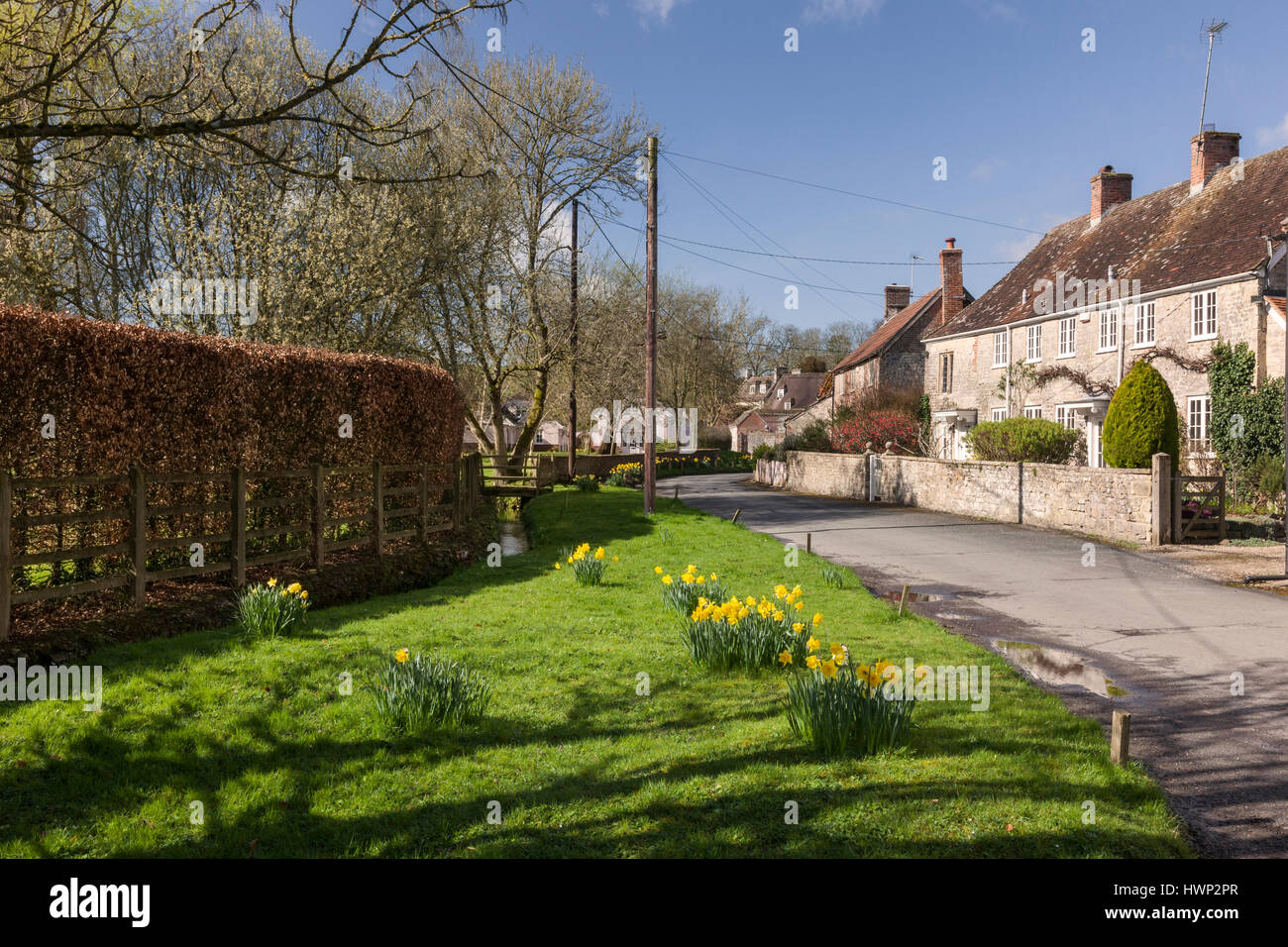 A street in the pretty village of Sutton Veny, Wiltshire, England, UK ...