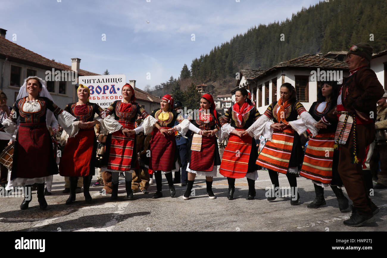 People in traditional costumes dance bulgarian horo in village Shiroka ...