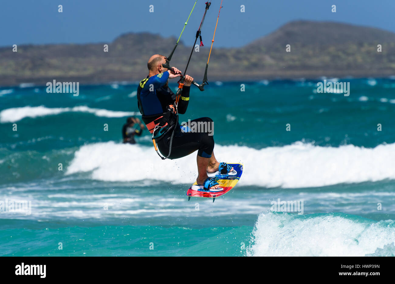 Kite Surfer Jumping Over Waves Stock Photo - Alamy