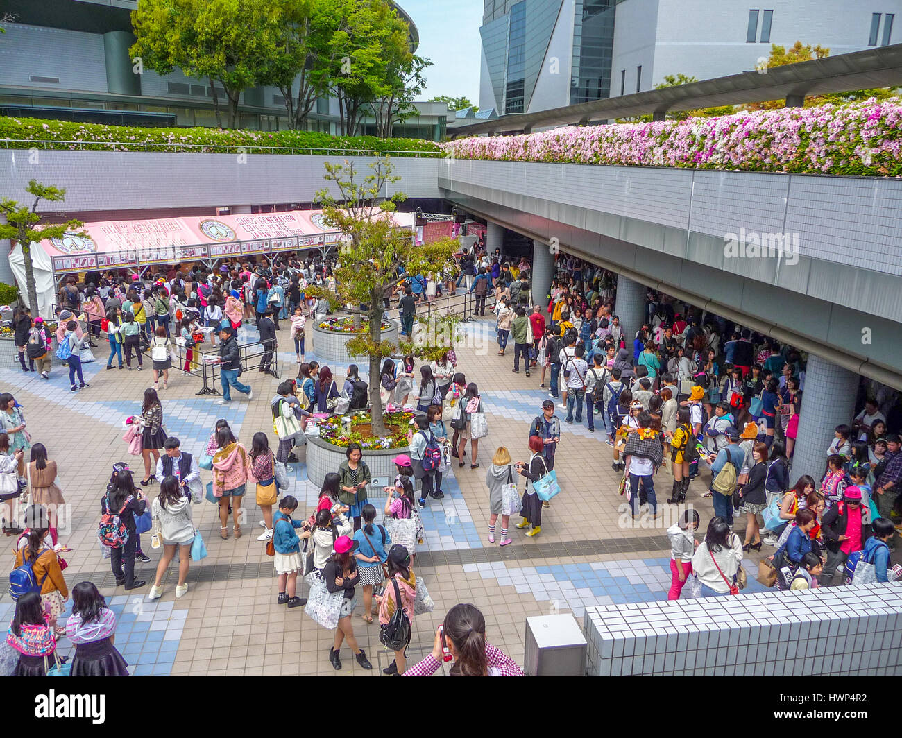 Big crowd of people, fans, waiting in line for a concert of Girls ...