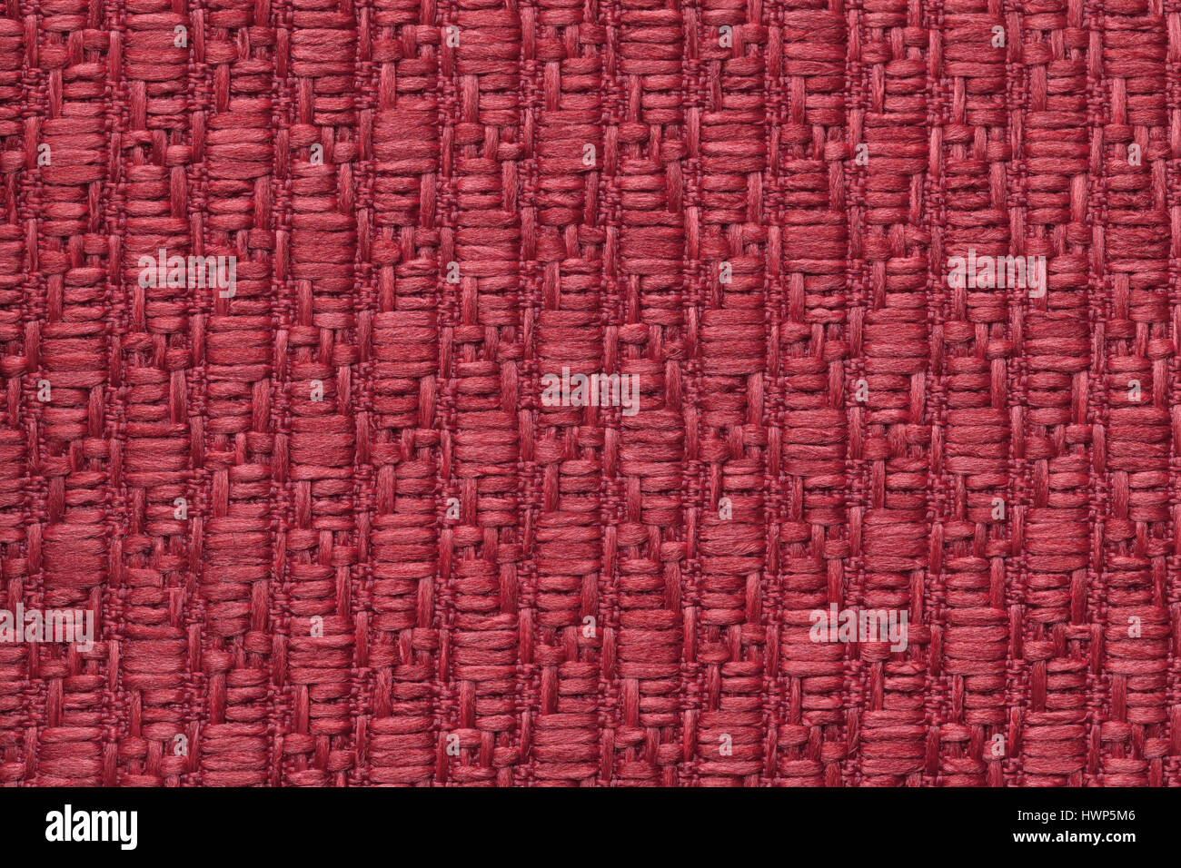 Dark red knitted woolen background with a pattern of soft, fleecy cloth ...