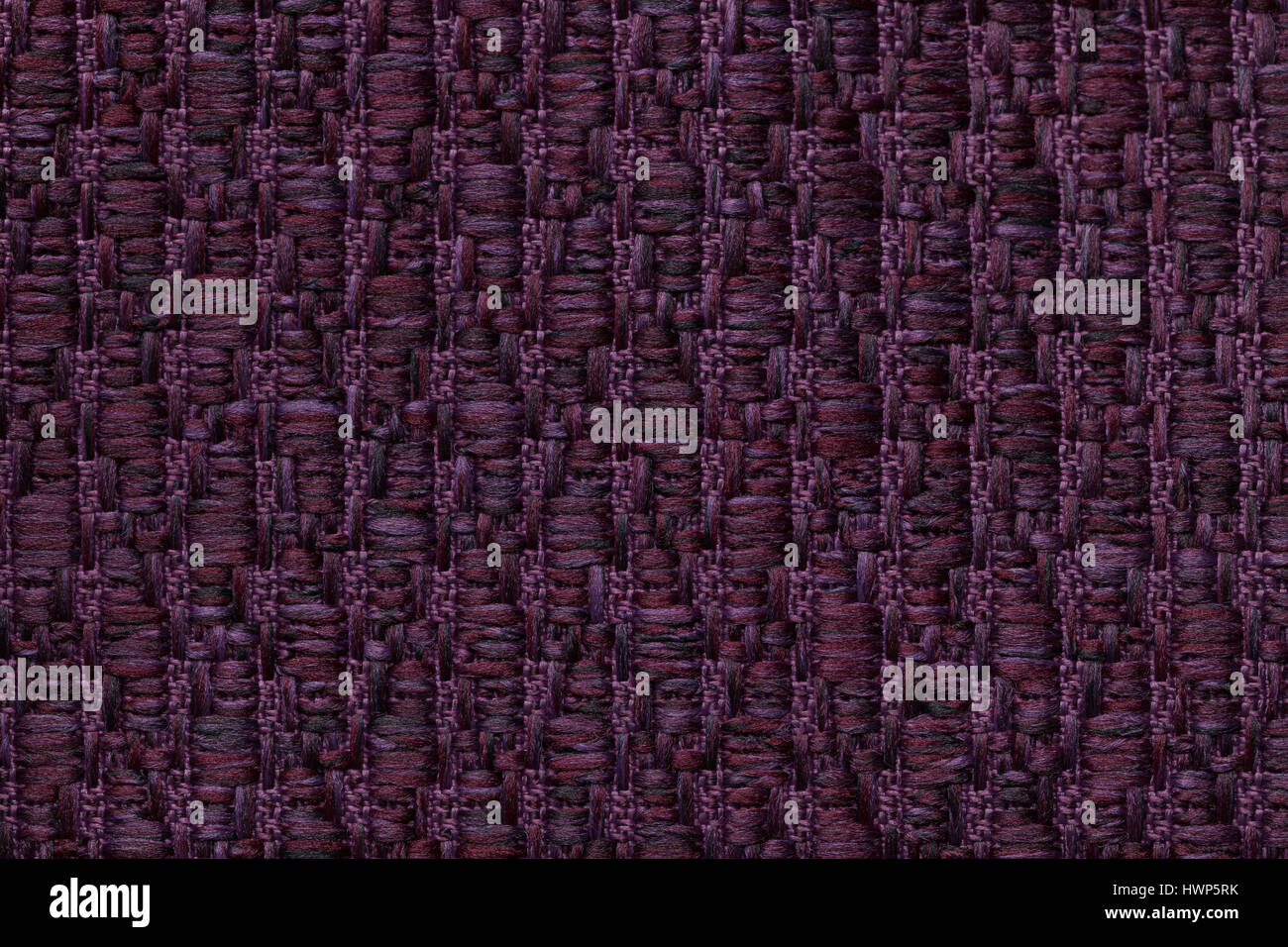 Dark purple knitted woolen background with a pattern of soft, fleecy ... Dark purple knitted woolen background with a pattern of soft, fleecy ...