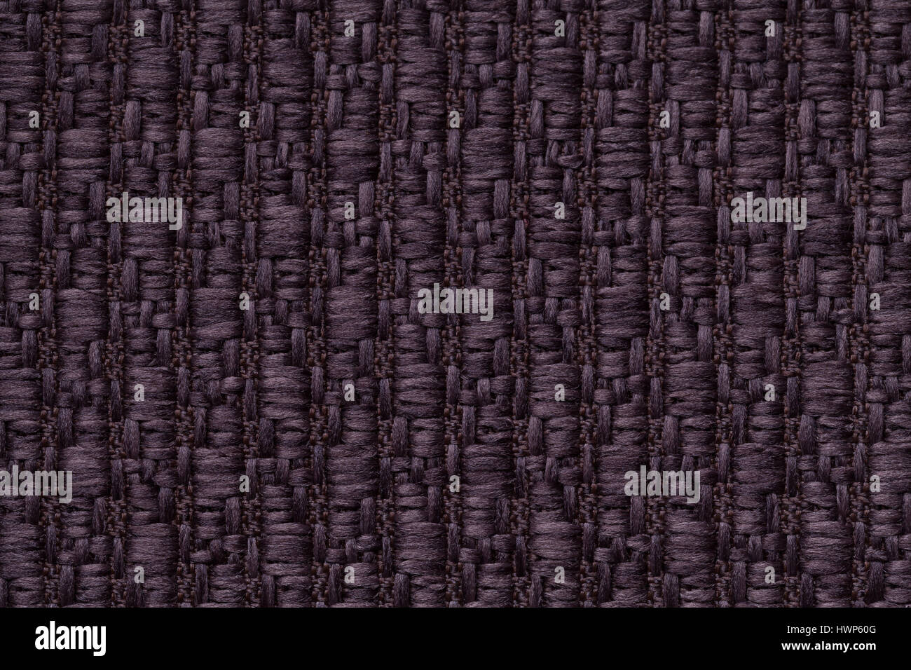 Dark purple knitted woolen background with a pattern of soft, fleecy ... Dark purple knitted woolen background with a pattern of soft, fleecy ...