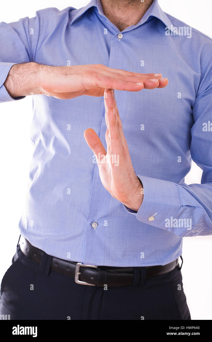 Businessman showing time out sign with hands Stock Photo - Alamy