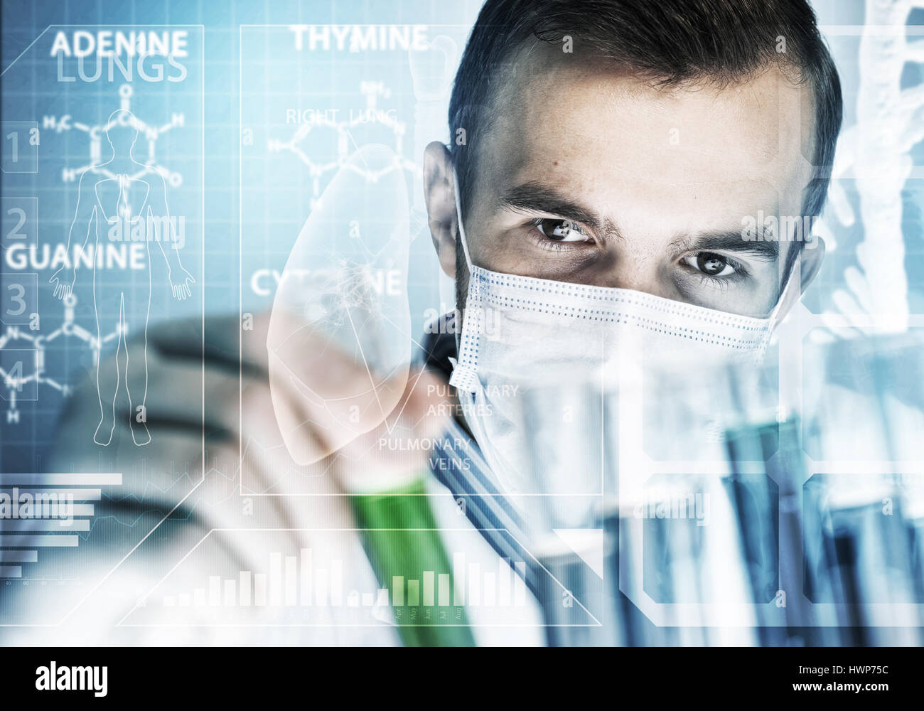 Portrait of concentrated male scientist working with reagents in ...