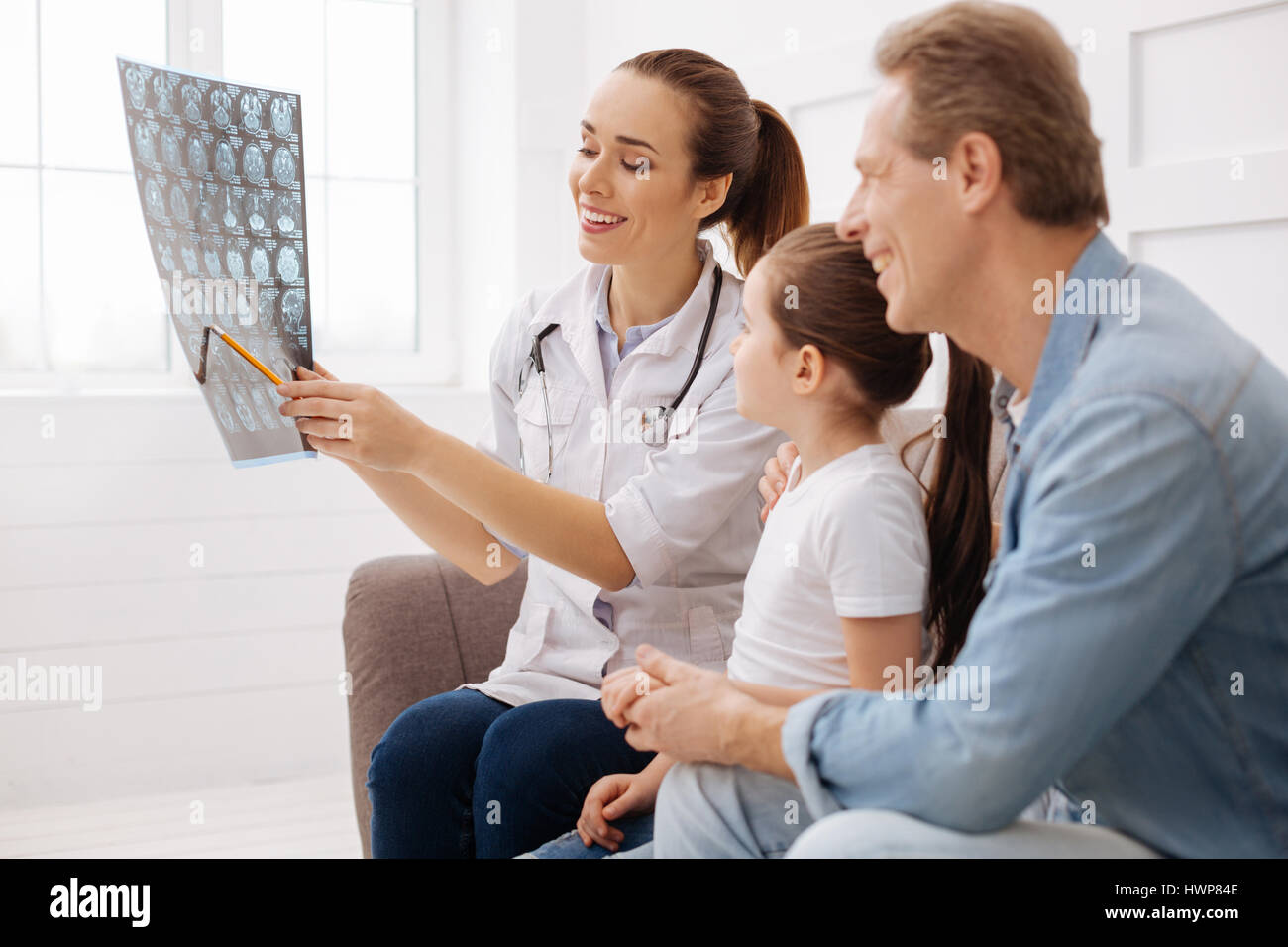 You did great. Smiling pretty prominent doctor looking delighted ...