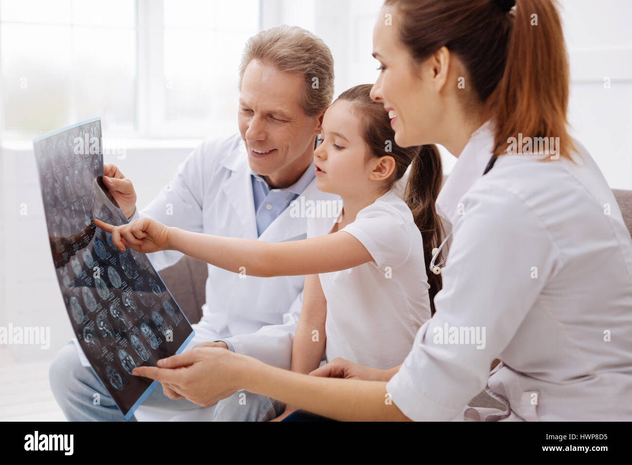 Is this me. Smart beautiful little girl pointing at the brain scan ...