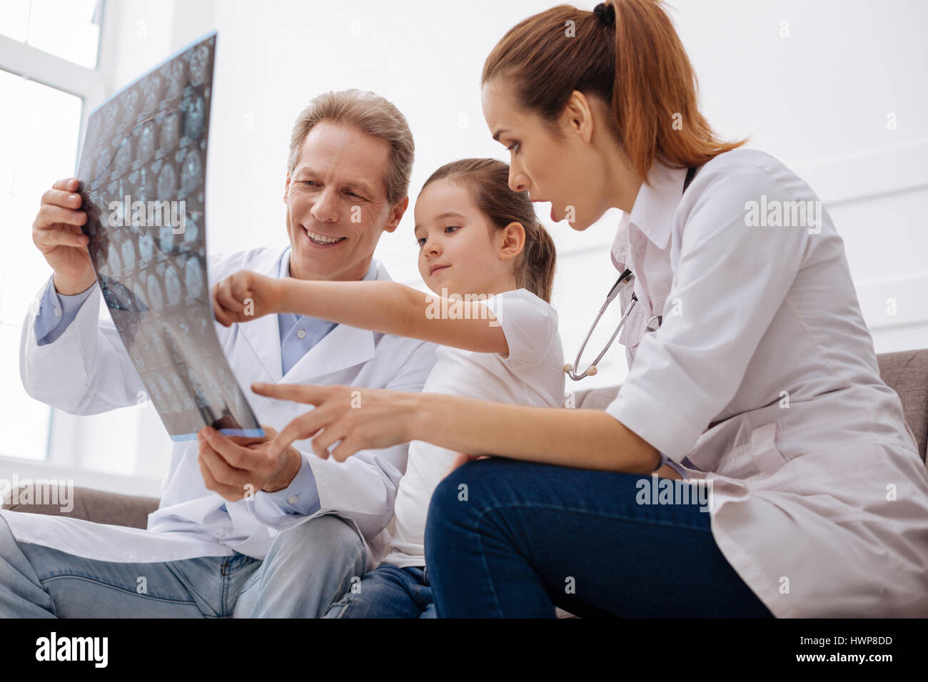 Let us check it together. Wise competent prominent surgeons looking ...