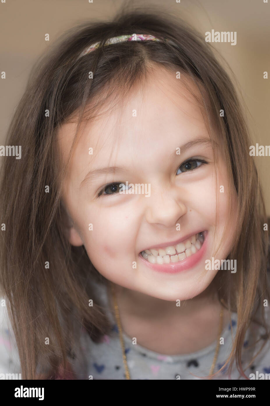 Child funny smile cute beautiful pose Stock Photo - Alamy