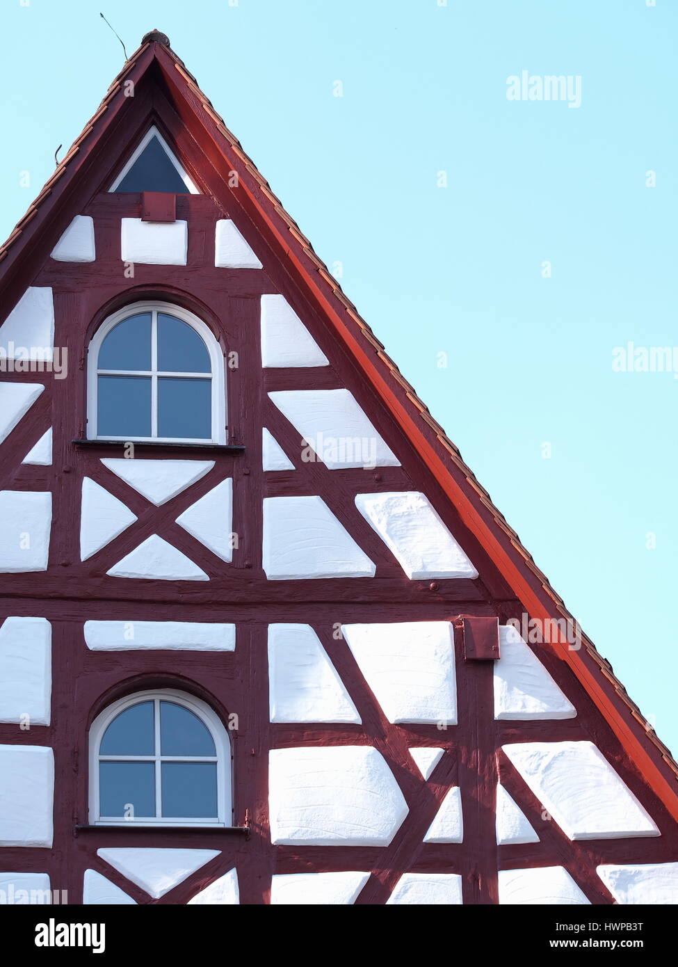 Gable and façade details of an old timber frame medieval house with ...